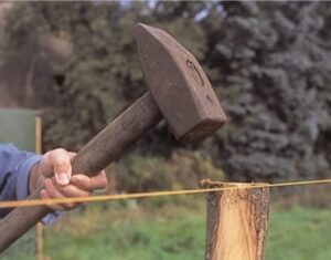 How to build a rustic stake garden fence