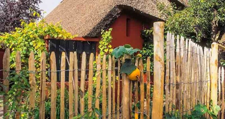 How to build a rustic stake garden fence